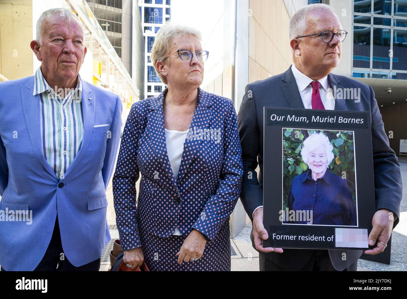 (L-R) Siblings Graham, Debra and Michael Barnes pose for a photograph ...