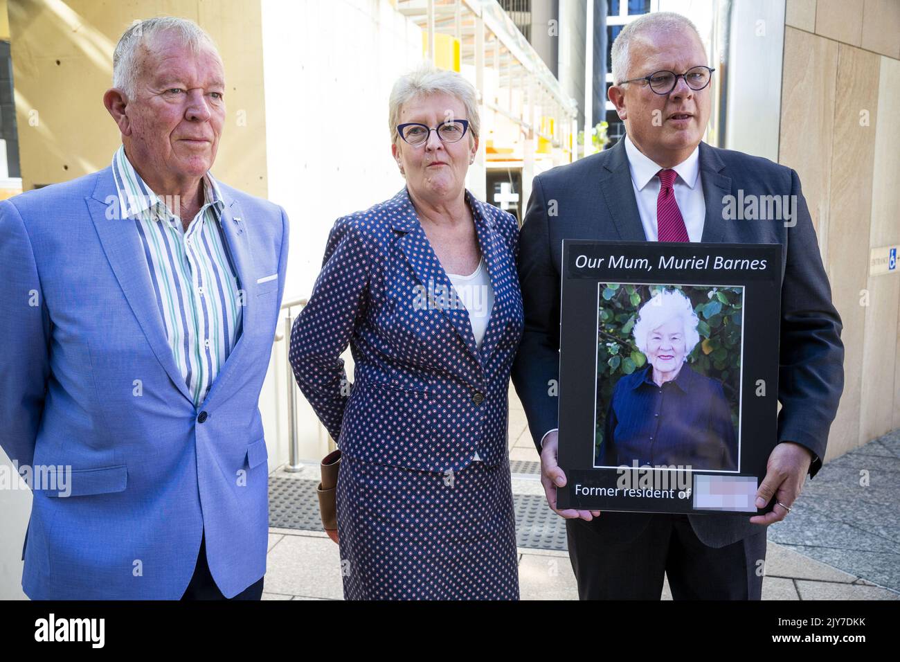 (L-R) Siblings Graham, Debra and Michael Barnes pose for a photograph ...