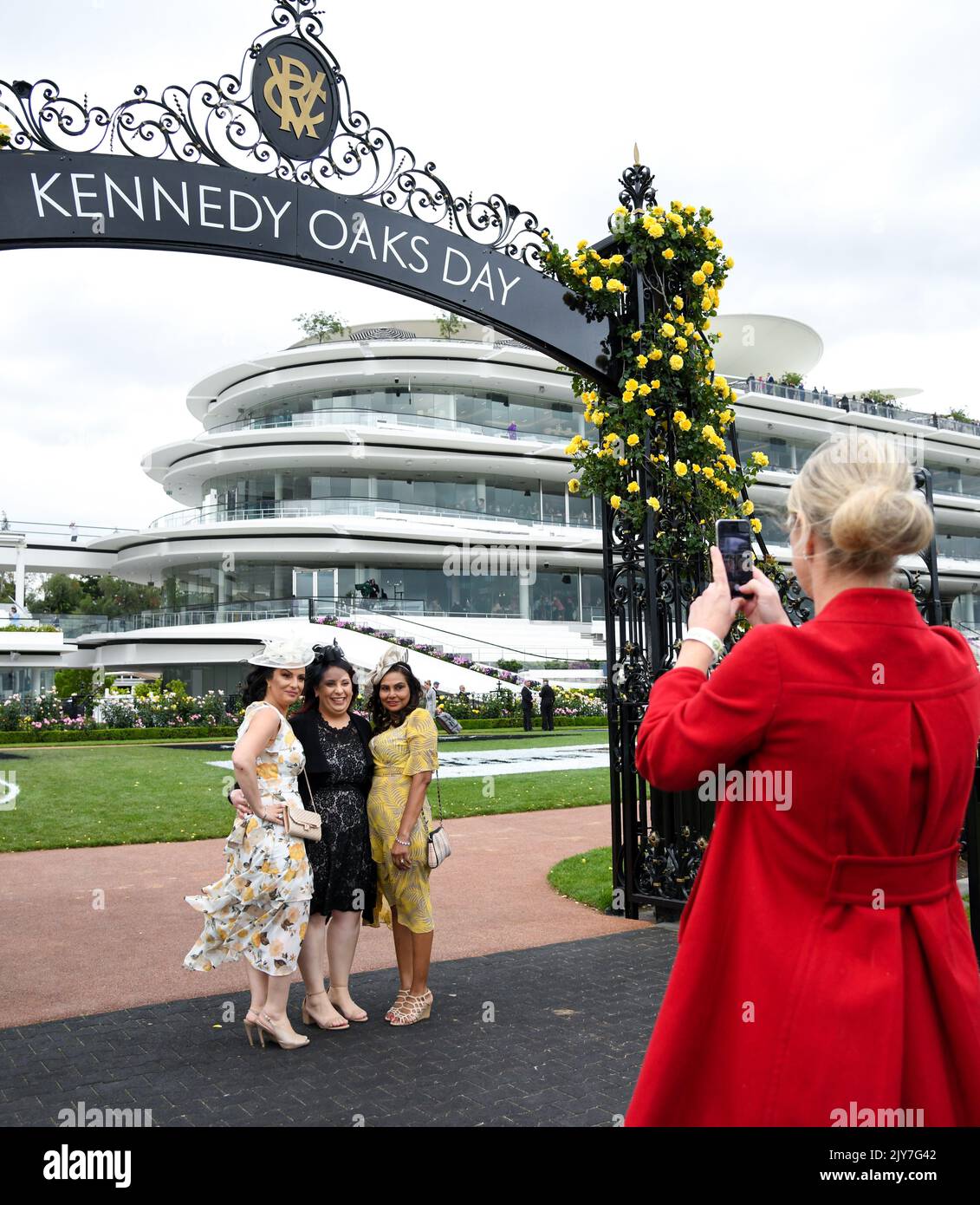 Racegoers are seen during Oaks Day at Flemington Racecourse in ...