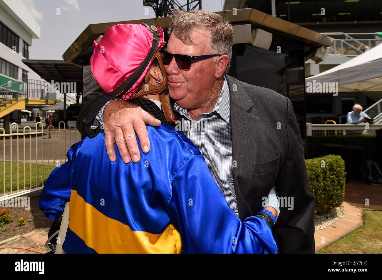 Jockey Stephanie Thornton hugs trainer Rex Lipp after riding Red Stina ...