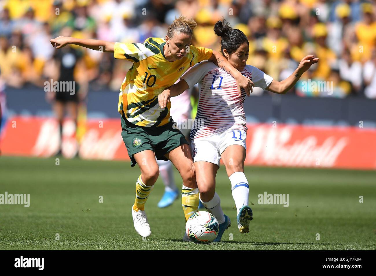 Emily Van Egmond of the Matildas competes for possession with Yesenia ...