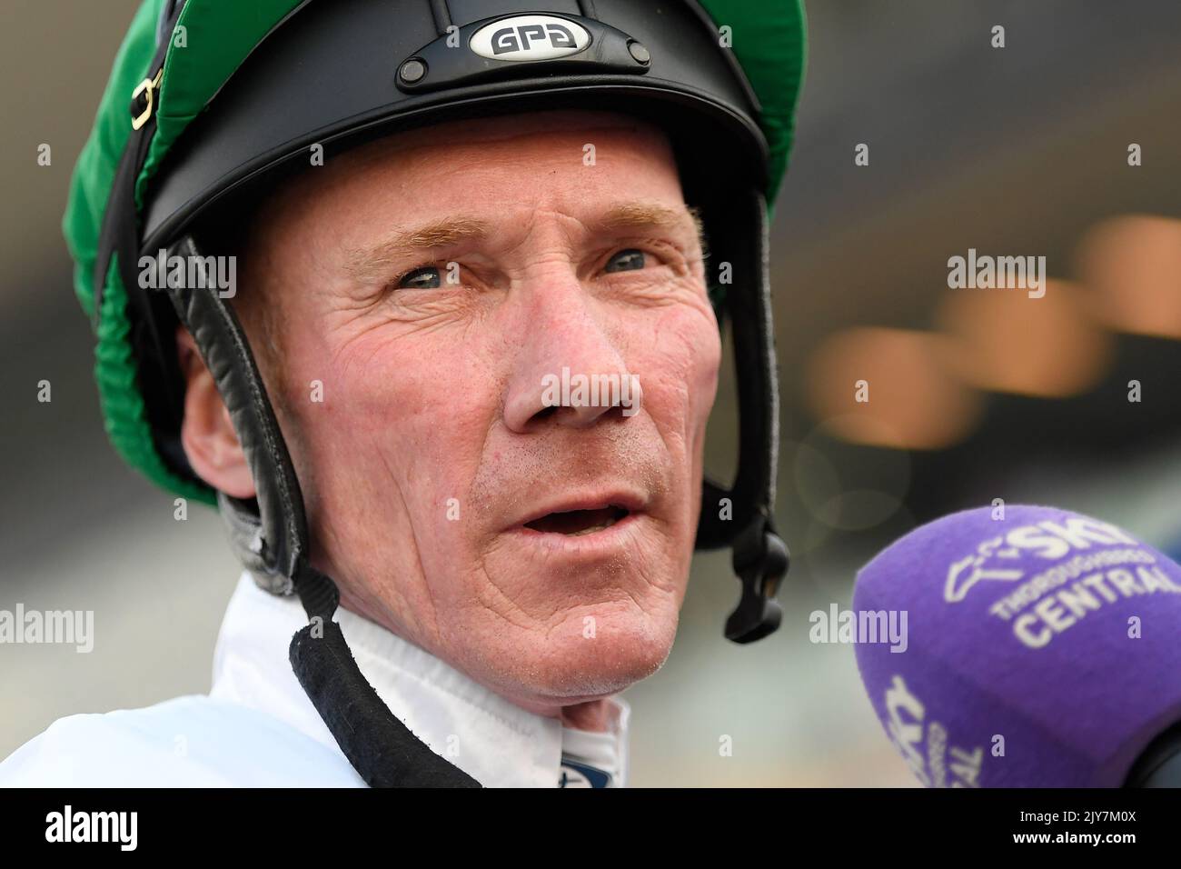 Jockey Jim Byrne speaks to the media after riding Outback Barbie to ...
