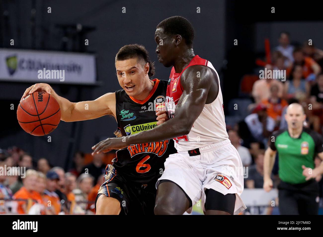 Hawks Sunday Dech defends against Taipans Jarrod Kenny during the Round ...