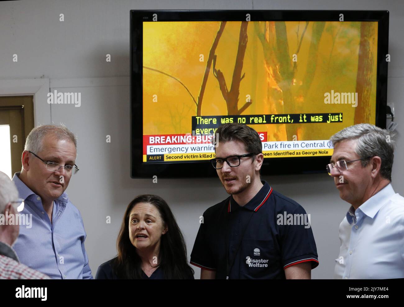 Prime Minister Scott Morrison is seen talking to people during a visit ...