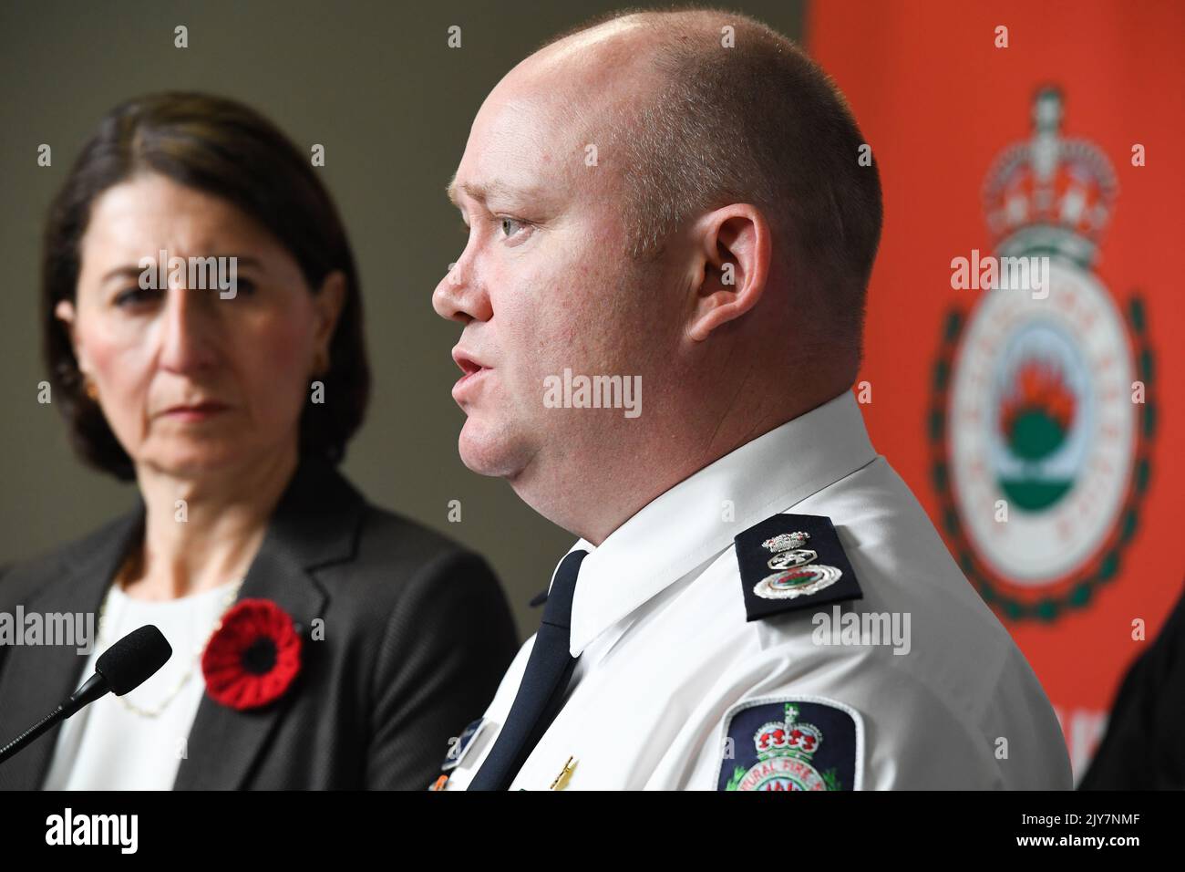NSW Premier Gladys Berejiklian watches on as Commissioner NSW RFS Shane ...