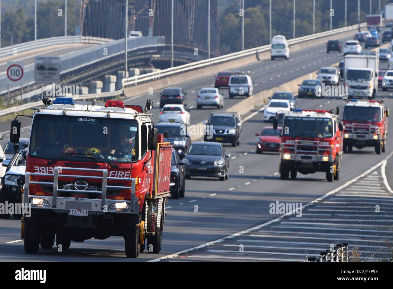 A convoy of Country Fire Authority (CFA) fire fighting trucks from ...