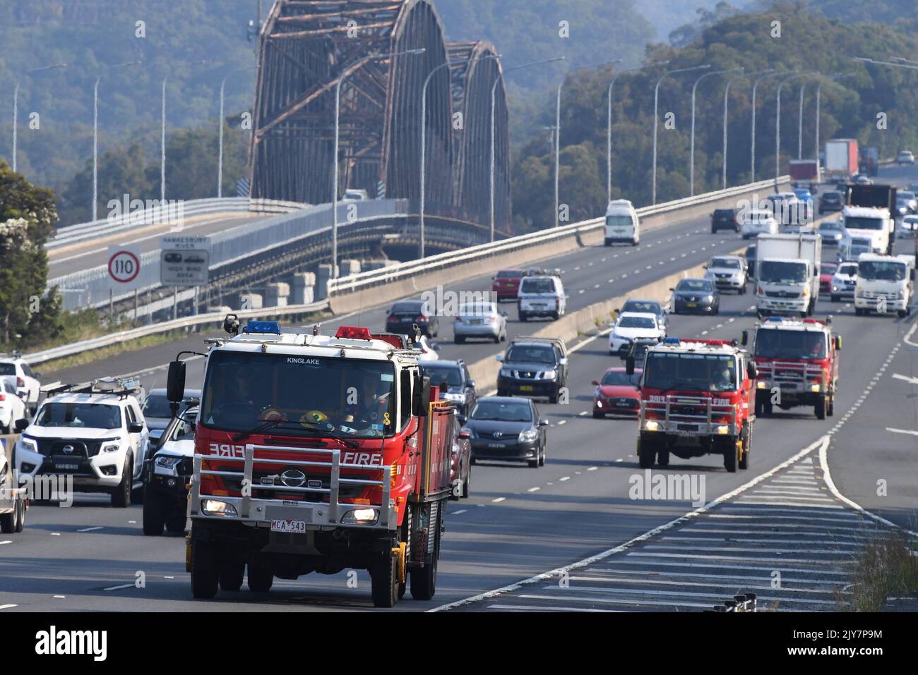 A convoy of Country Fire Authority (CFA) fire fighting trucks from ...