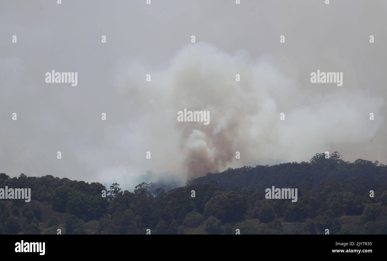 Smoke rises from a bushfire in the affected area of Nimbin, NSW ...