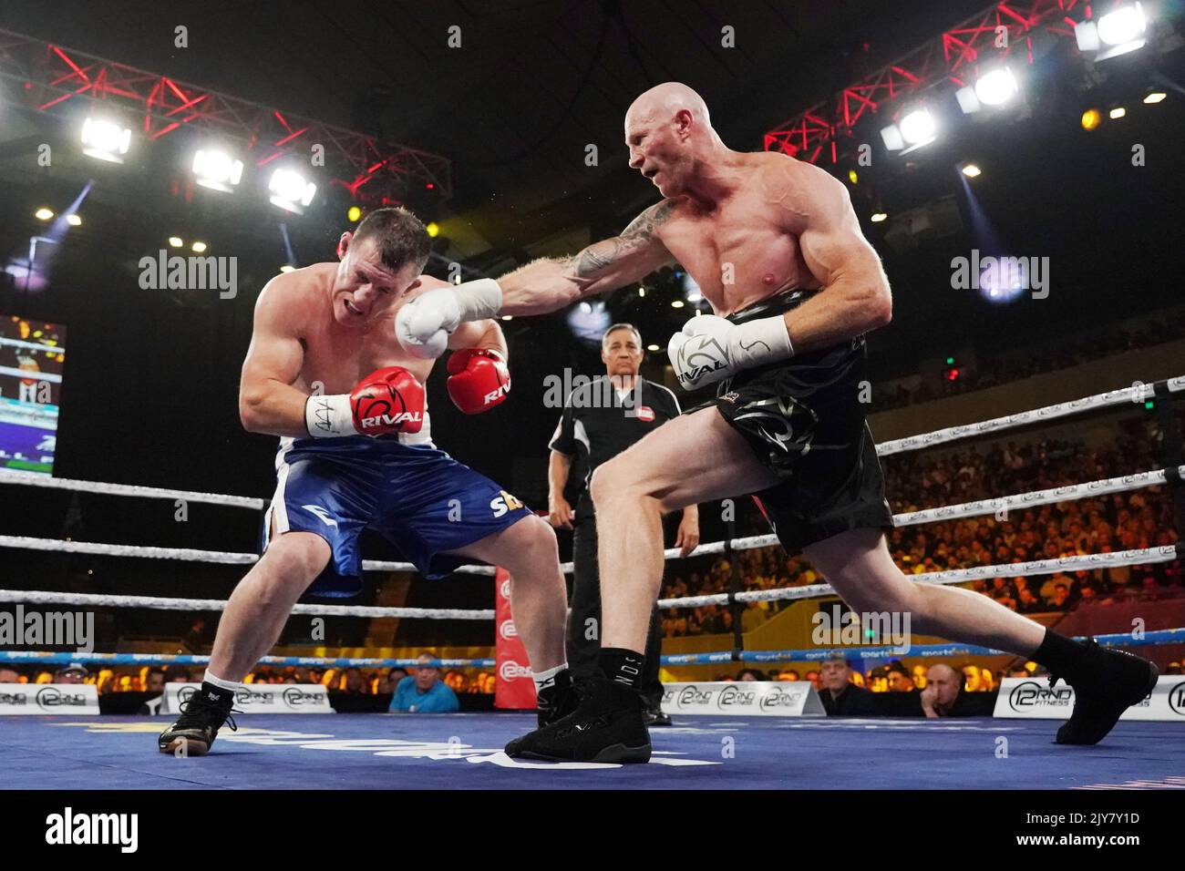 Paul Gallen and Barry Hall compete during the Code War Boxing night at ...