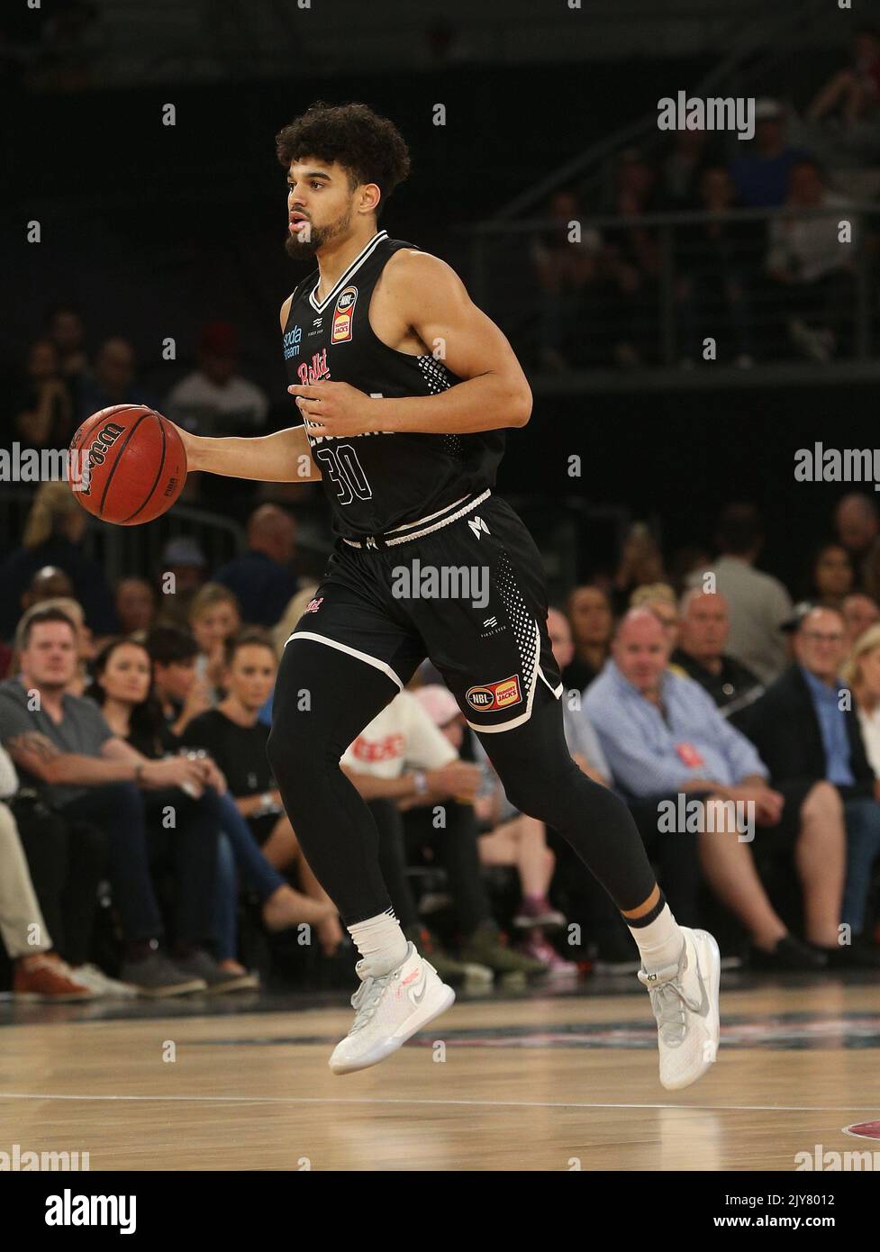 Sam McDaniel of Melbourne United brings the ball down court during the ...