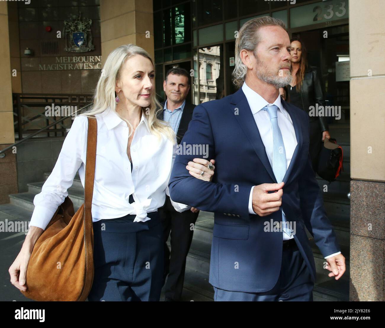 Australian actor Craig McLachlan and his partner Vanessa Scammell leave ...