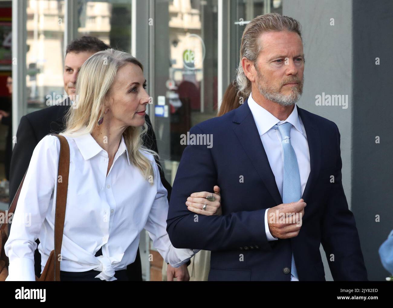 Australian actor Craig McLachlan and his partner Vanessa Scammell leave ...