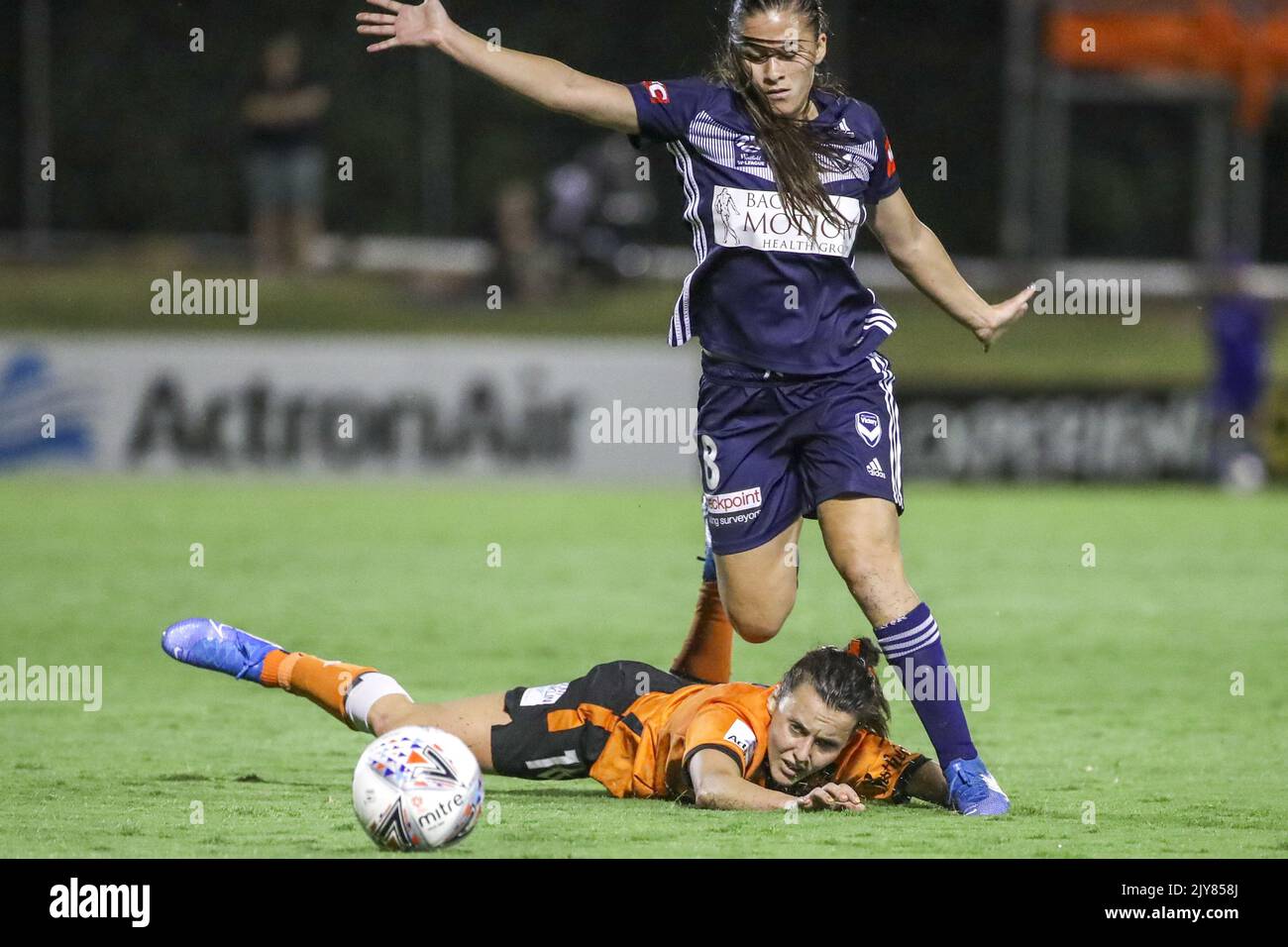 Hayley Raso of the Roar and Angela Beard of the Victory compete for the ...