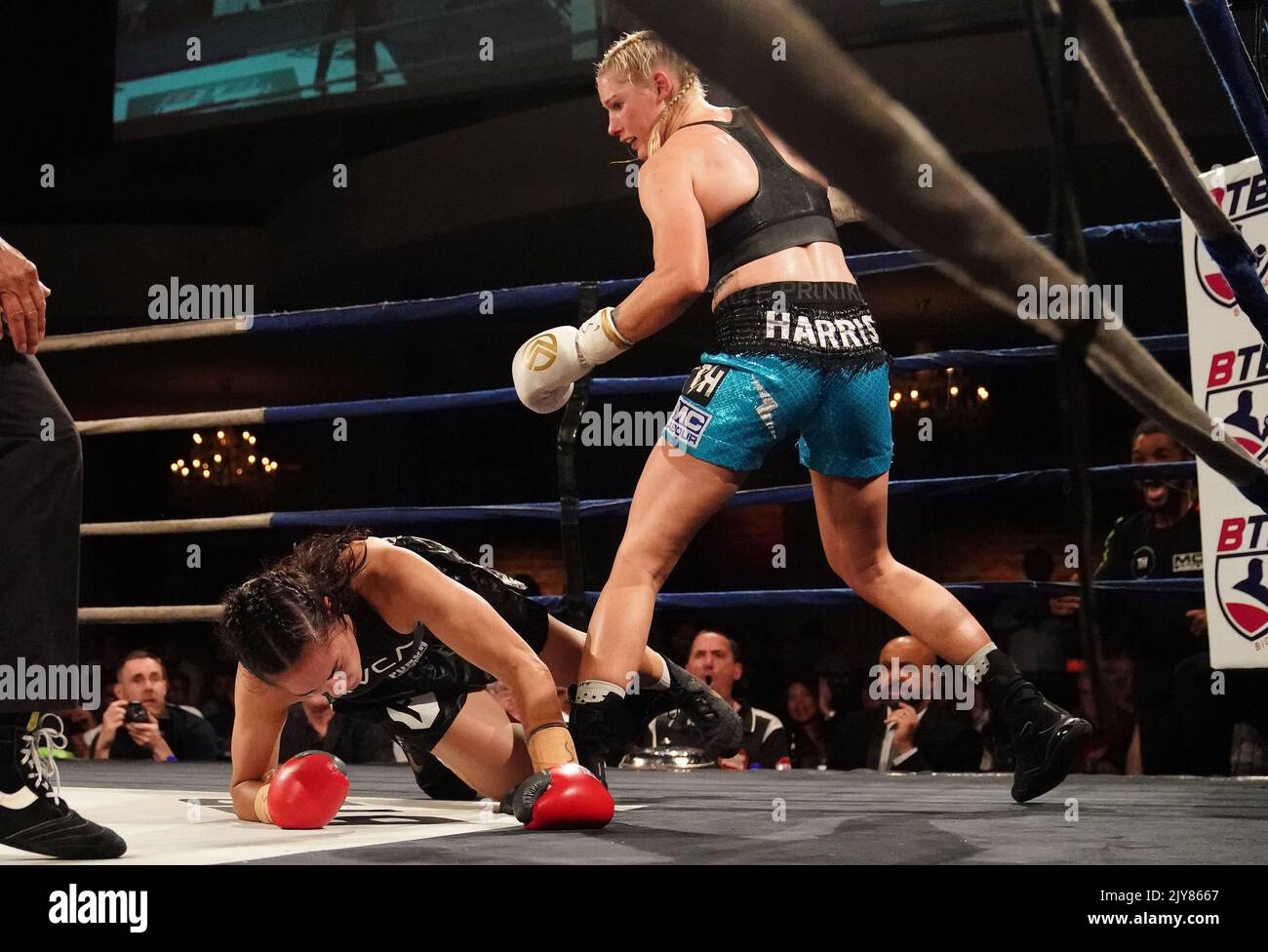 Tayla Harris knocks Janay Harding down as they compete in the Australia ...