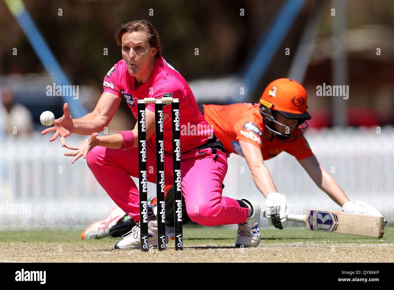 Sarah Aley of the Sixers attempts to run out Georgia Redmayne of the ...