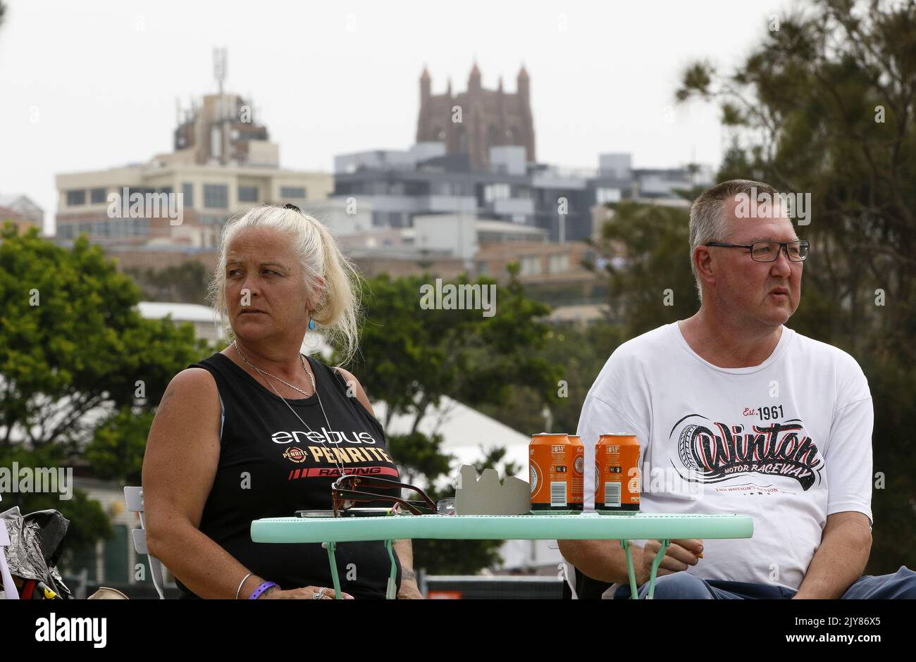 Supercars fans Greer Dobson and Dave Eden of Minto take a break from ...