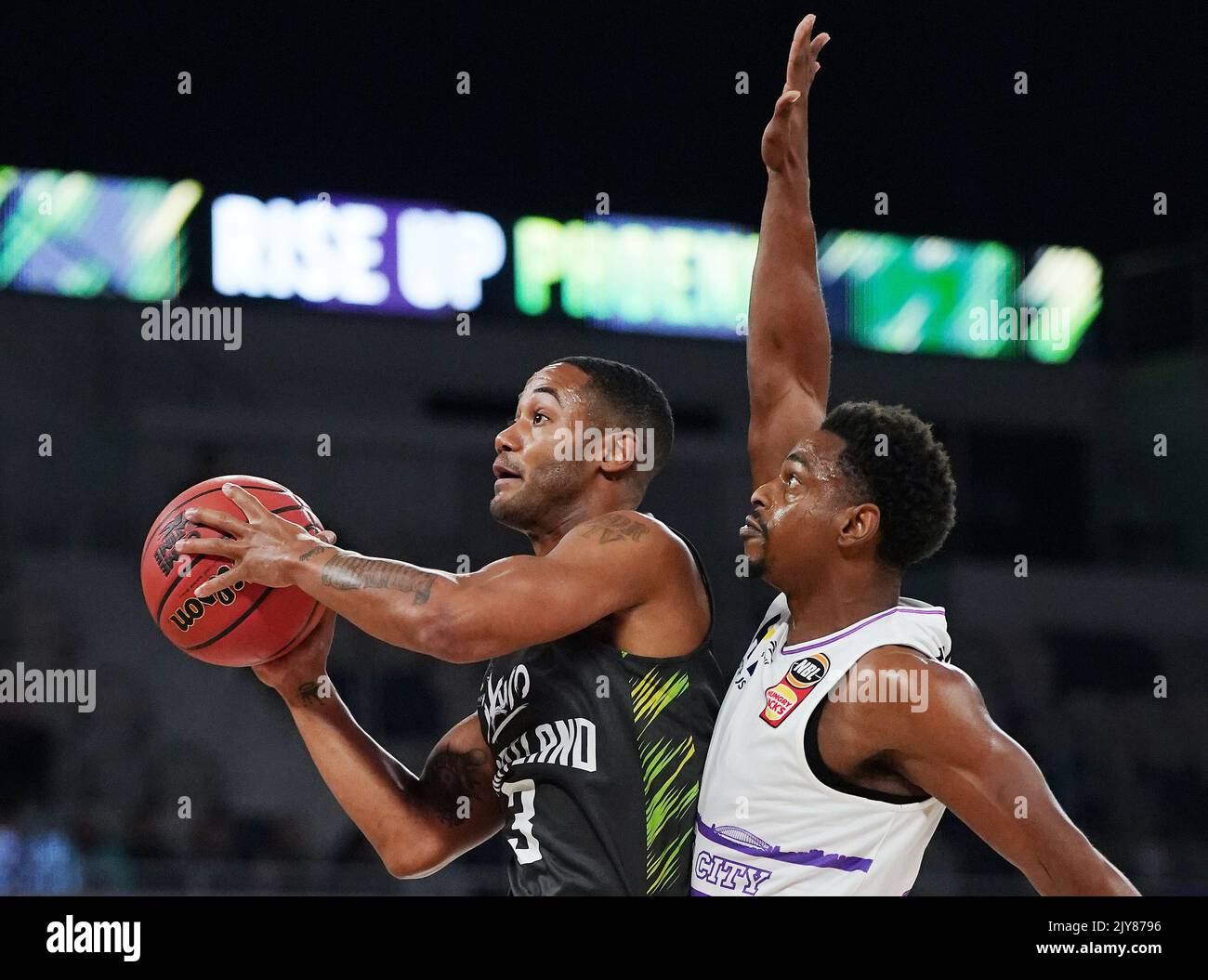 John Roberson of the Phoenix shoots ahead of Casper Ware of the Kings ...