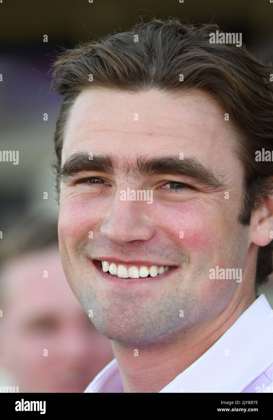 Trainer David Eustace is seen after jockey Michael Poy rode Kardashing ...