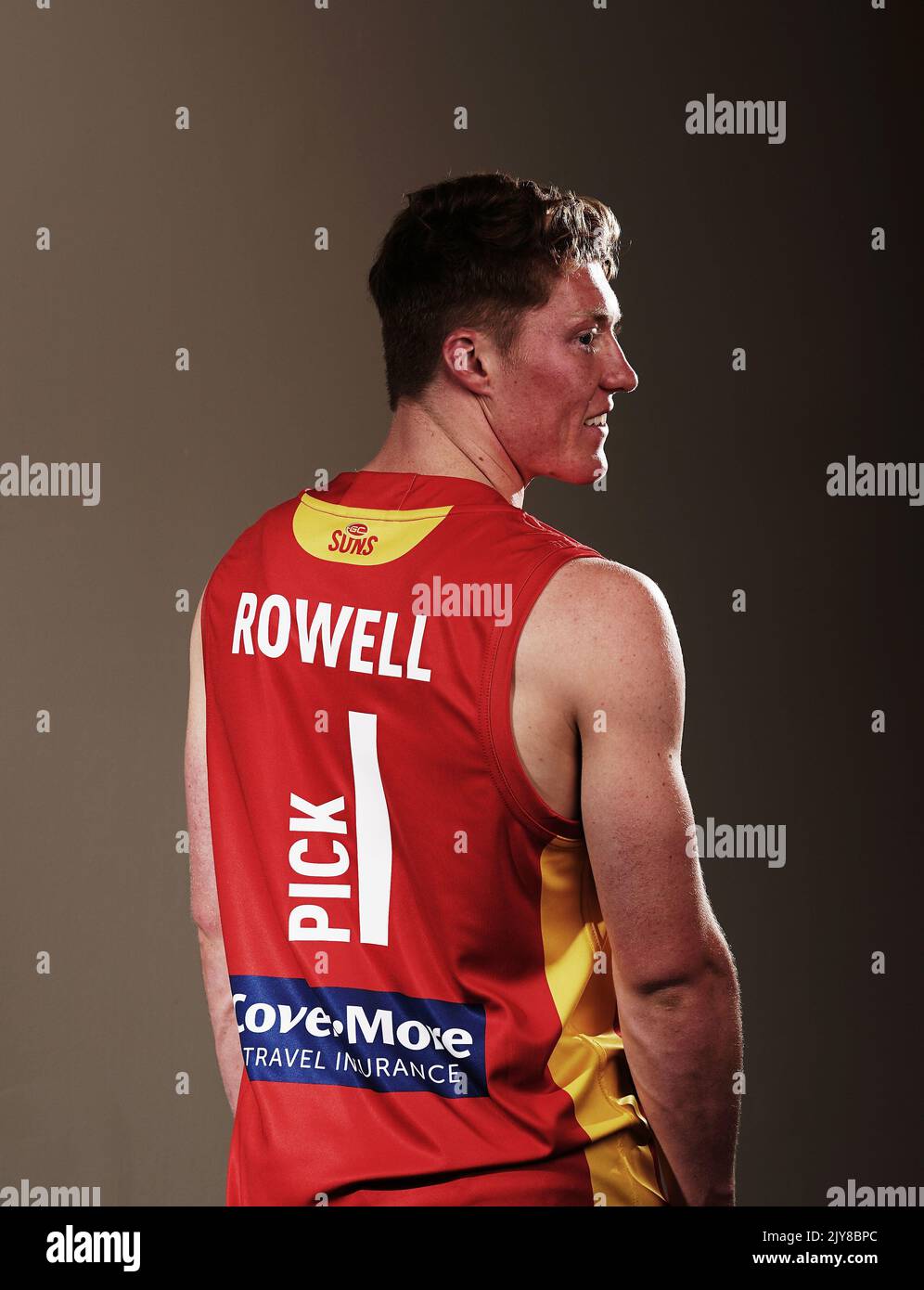 Number 1 draft pick Matthew Rowell of the Gold Coast Suns poses for a ...