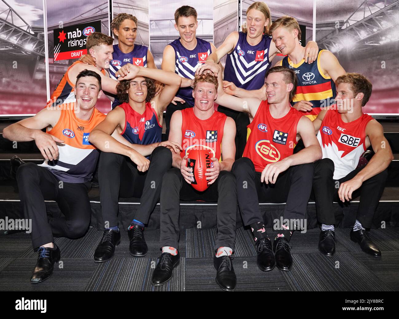 The top 10 draft picks including number one Matt Rowell (centre) pose ...