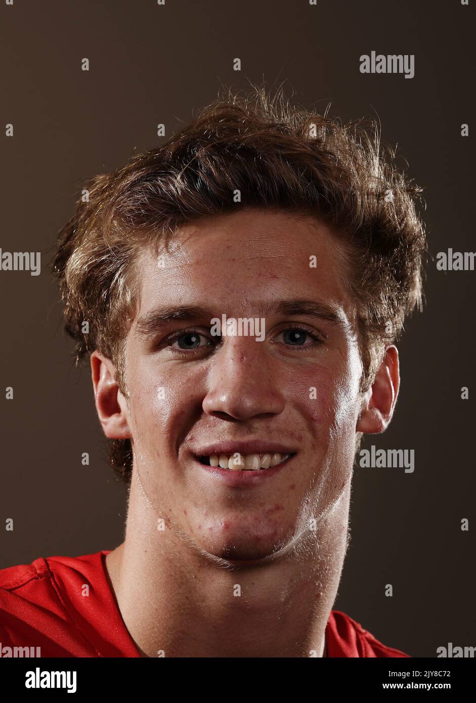 Number 5 draft pick Dylan Stephens of the Sydney Swans poses for a ...