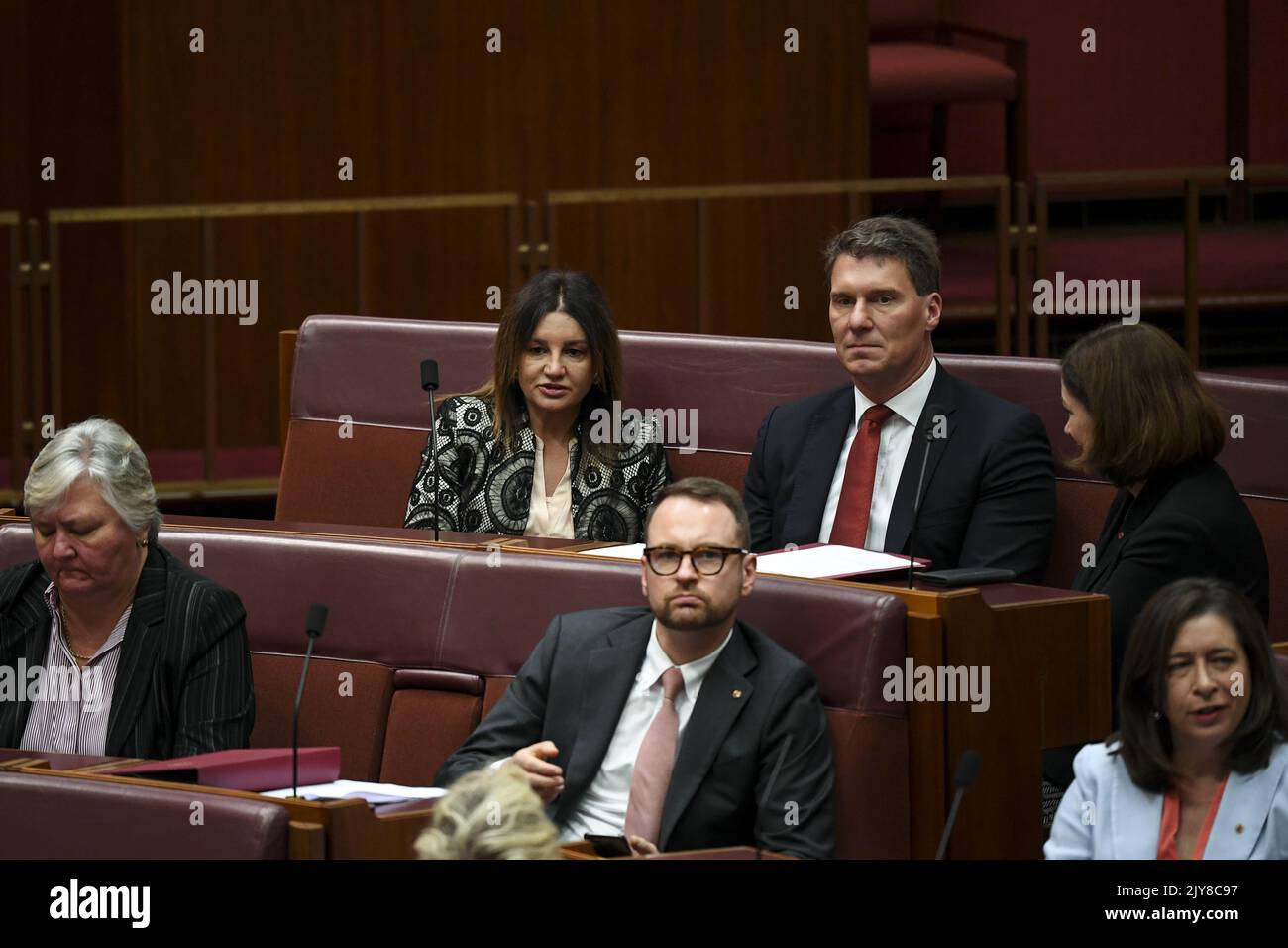 Crossbench Senator Jacqui Lambie (top left) is seen during a division ...