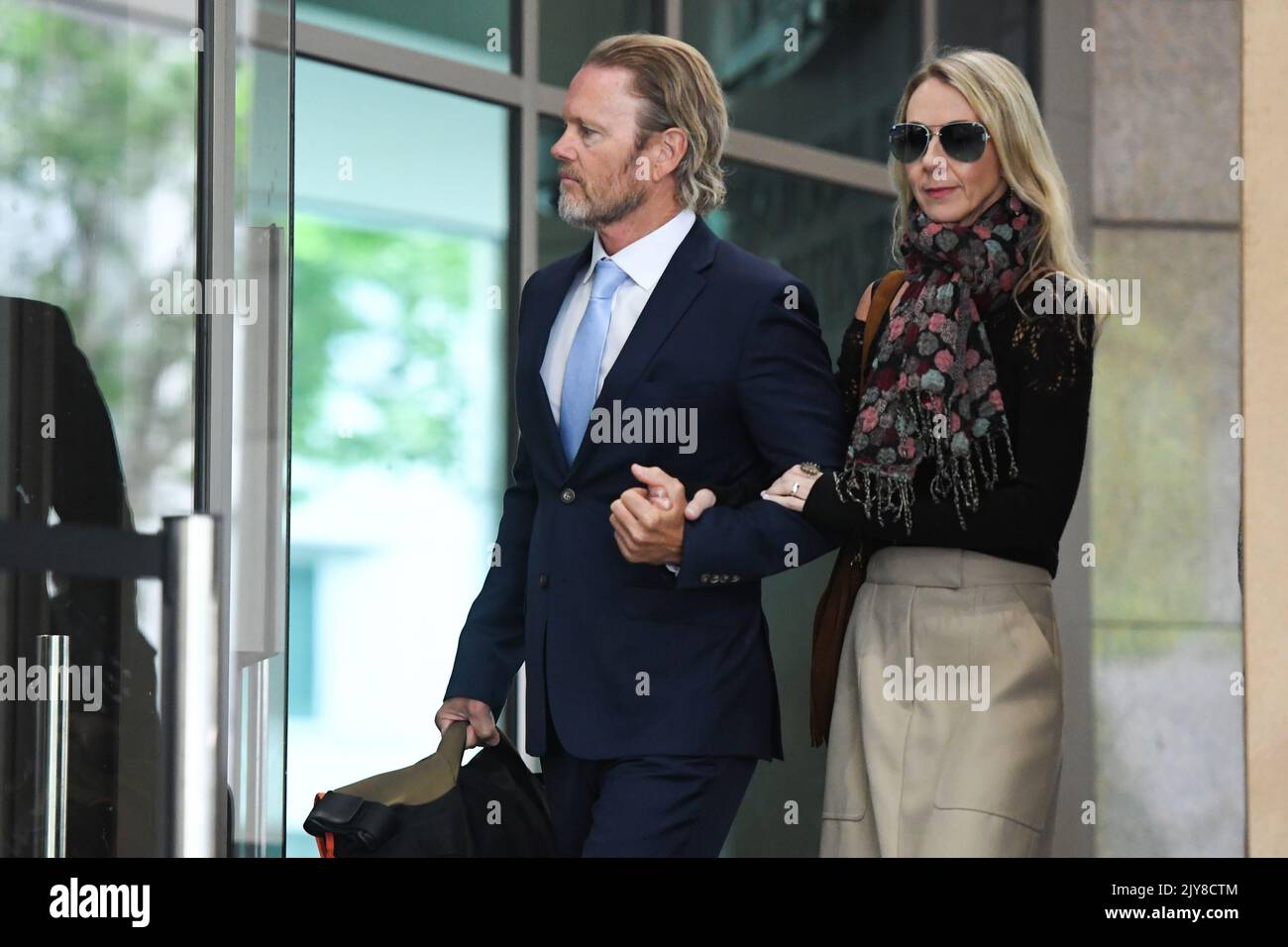 Australian actor Craig McLachlan (left) and his partner Vanessa ...