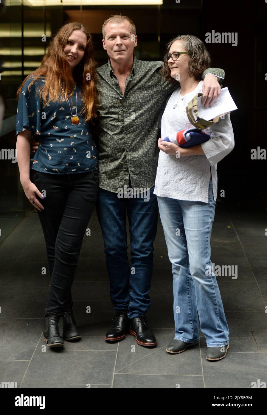 Australian academic Timothy Weeks poses for a photograph with his ...
