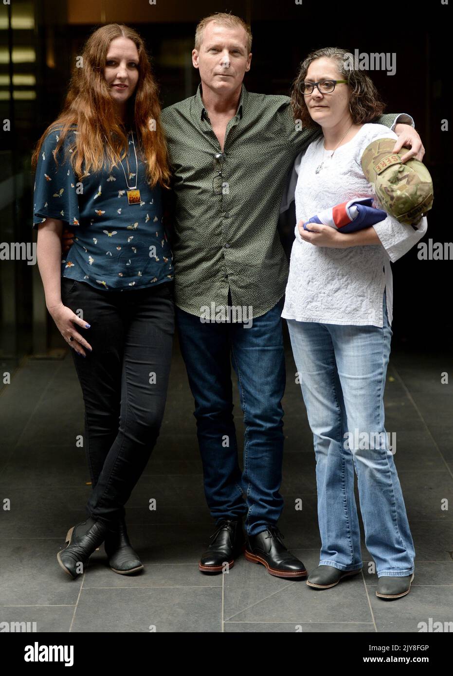 Australian academic Timothy Weeks poses for a photograph with his ...