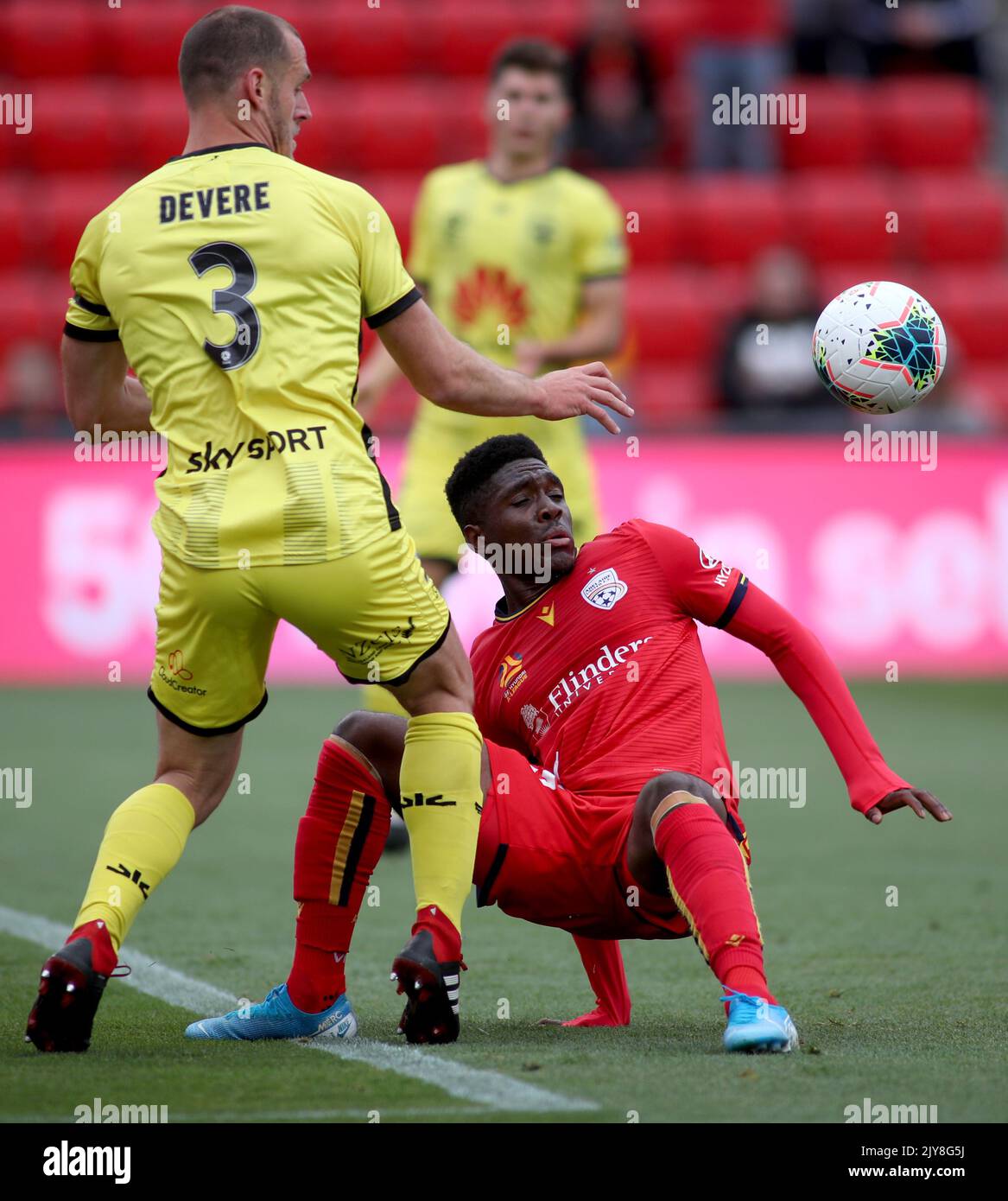 Luke DeVere of the Phoenix and Al Hassan Toure of United during the ...