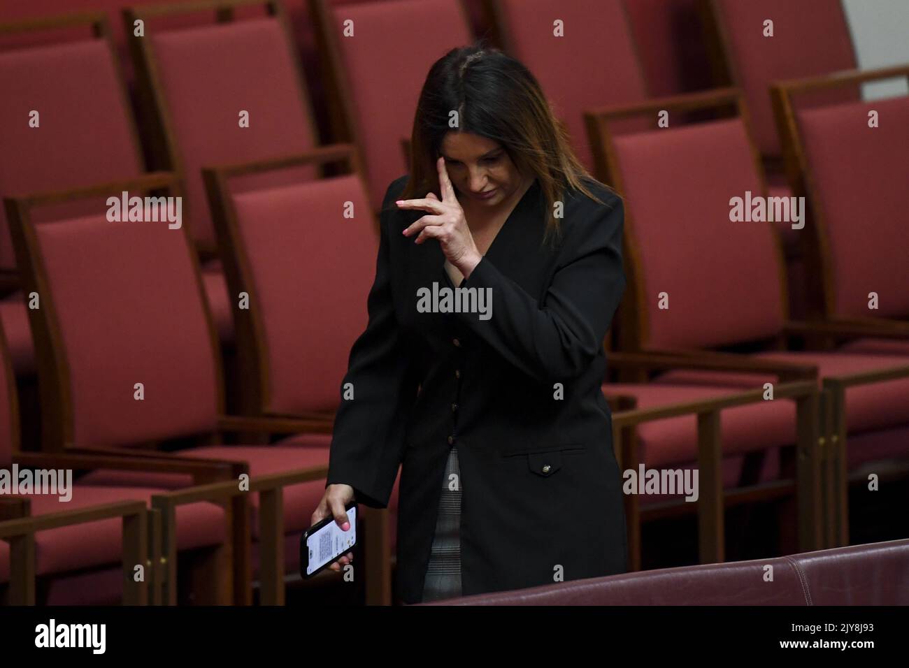 Crossbench Senator Jacqui Lambie reacts during debate in the Senate ...