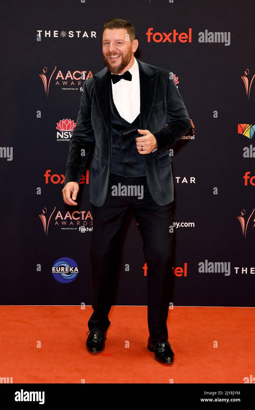 Manu Feildel arrives at the 2019 AACTA Awards at the Star in Sydney ...