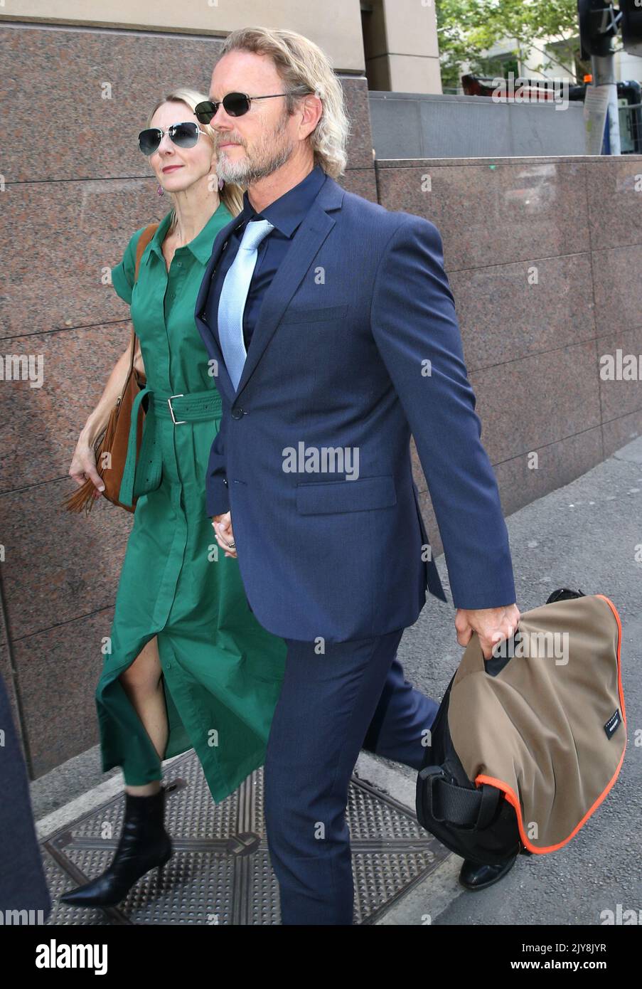 Australian actor Craig McLachlan and his partner Vanessa Scammell leave ...
