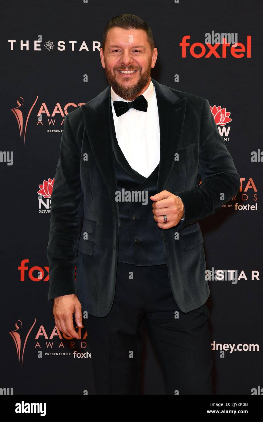 Manu Feildel arrives at the 2019 AACTA Awards at the Star in Sydney ...