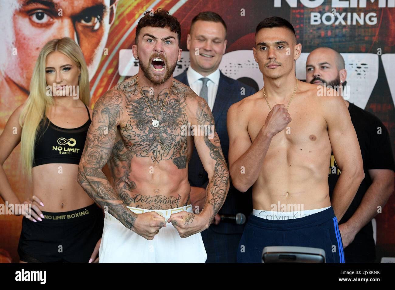Jack Brubaker (left) and Tim Tszyu gesture after facing off during the ...