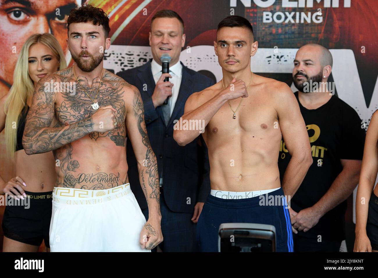 Jack Brubaker (left) and Tim Tszyu gesture after facing off during the ...