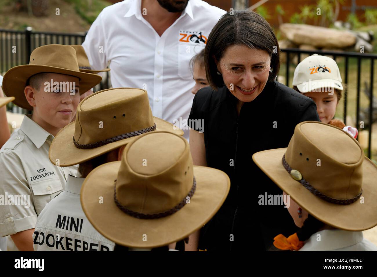 NSW Premier Gladys Berejiklian (centre right) speaks to 'mini ...
