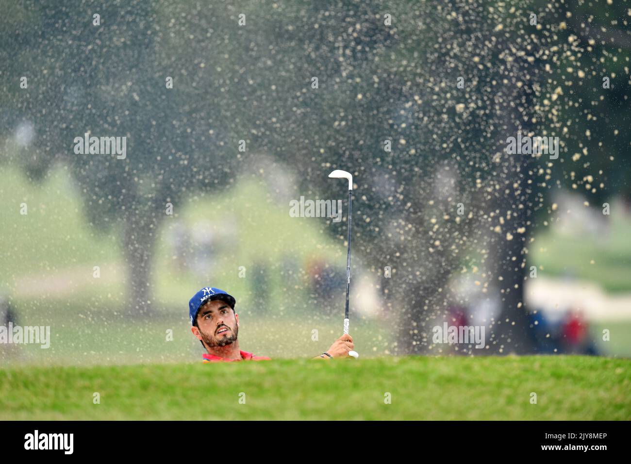 Abraham Ancer of Mexico takes a shot from the sand trap on the 10th ...