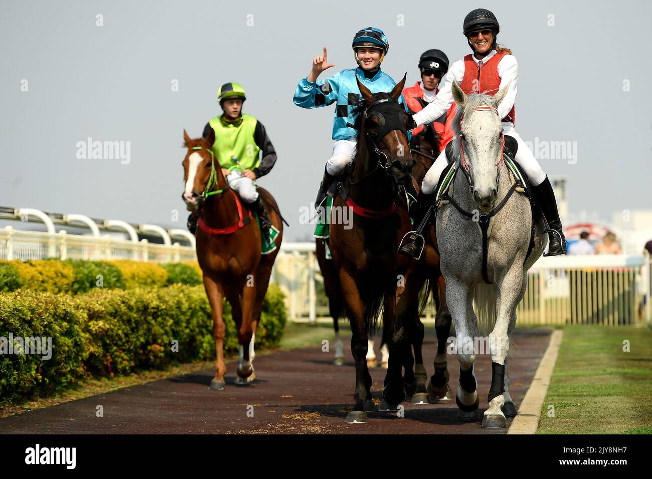Jockey Michael Hellyer gestures after riding Sheâ€™s Furline to victory ...