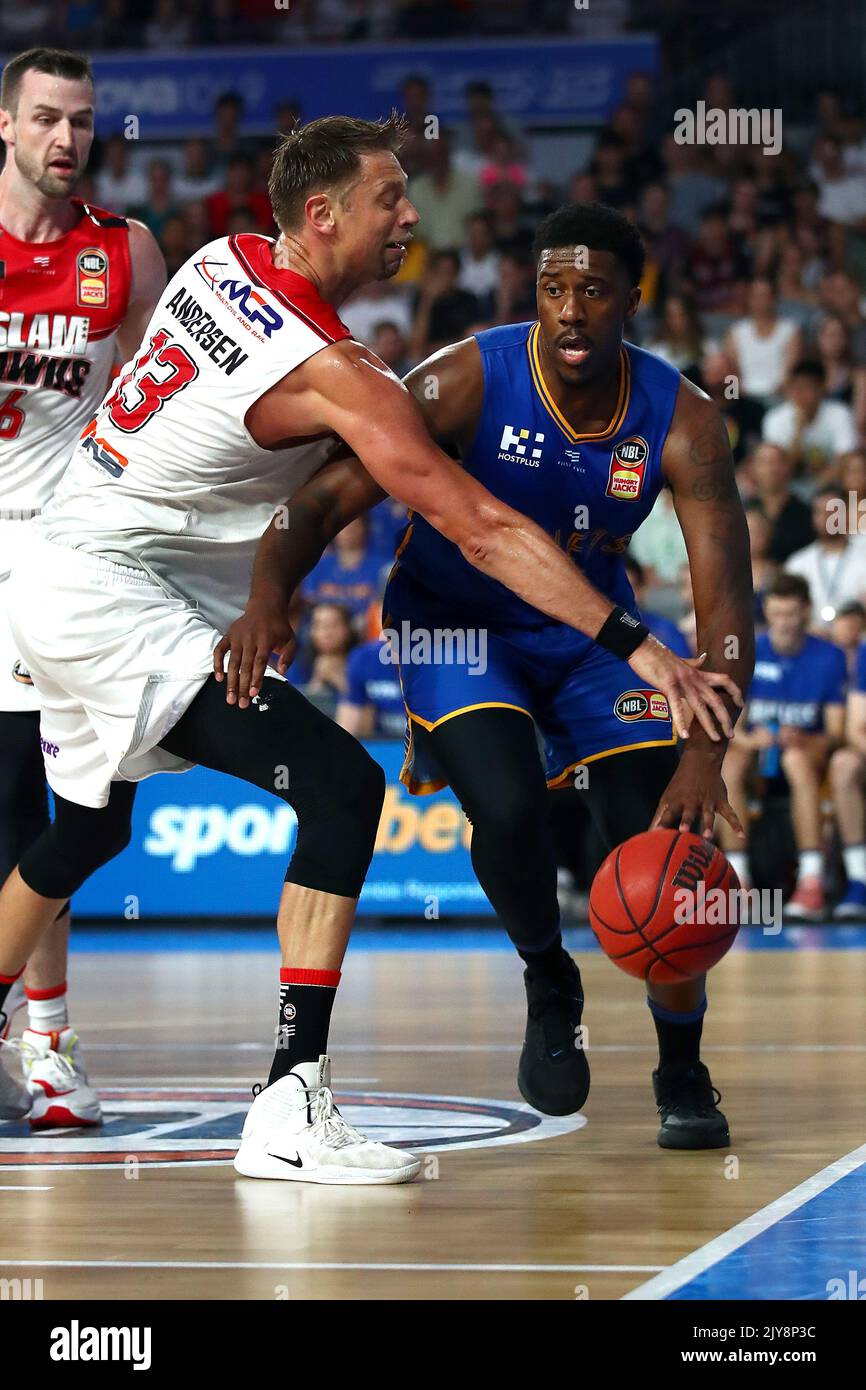 Lamar Patterson of the Bullets (right) drives past David Anderson of ...