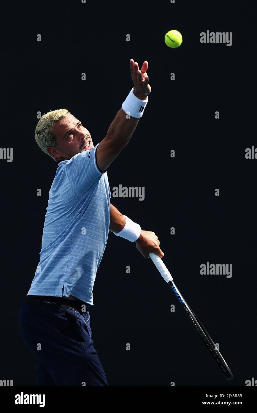 Alex Bolt of Australia serves during his match against Blake Mott of ...