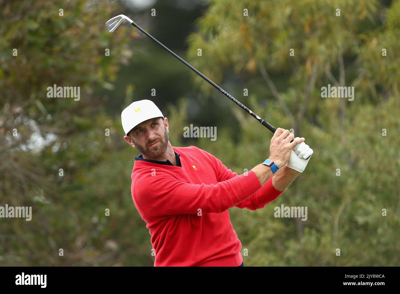Dustin Johnson of the United States team plays a shot during practice ...