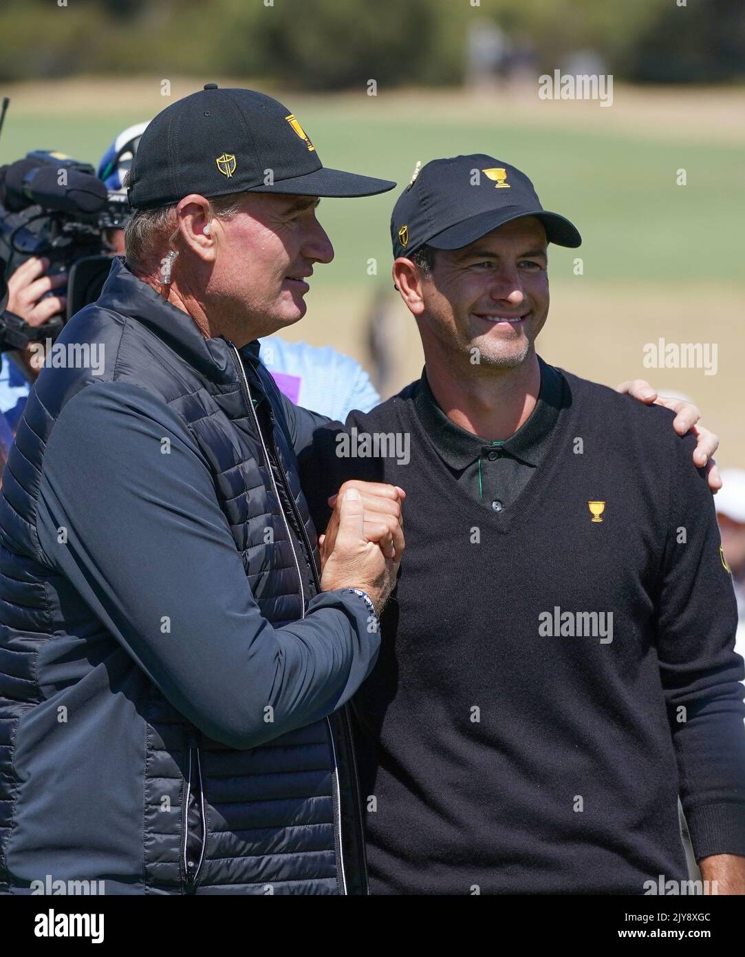Ernie Els of South Africa the International Team captain celebrates ...