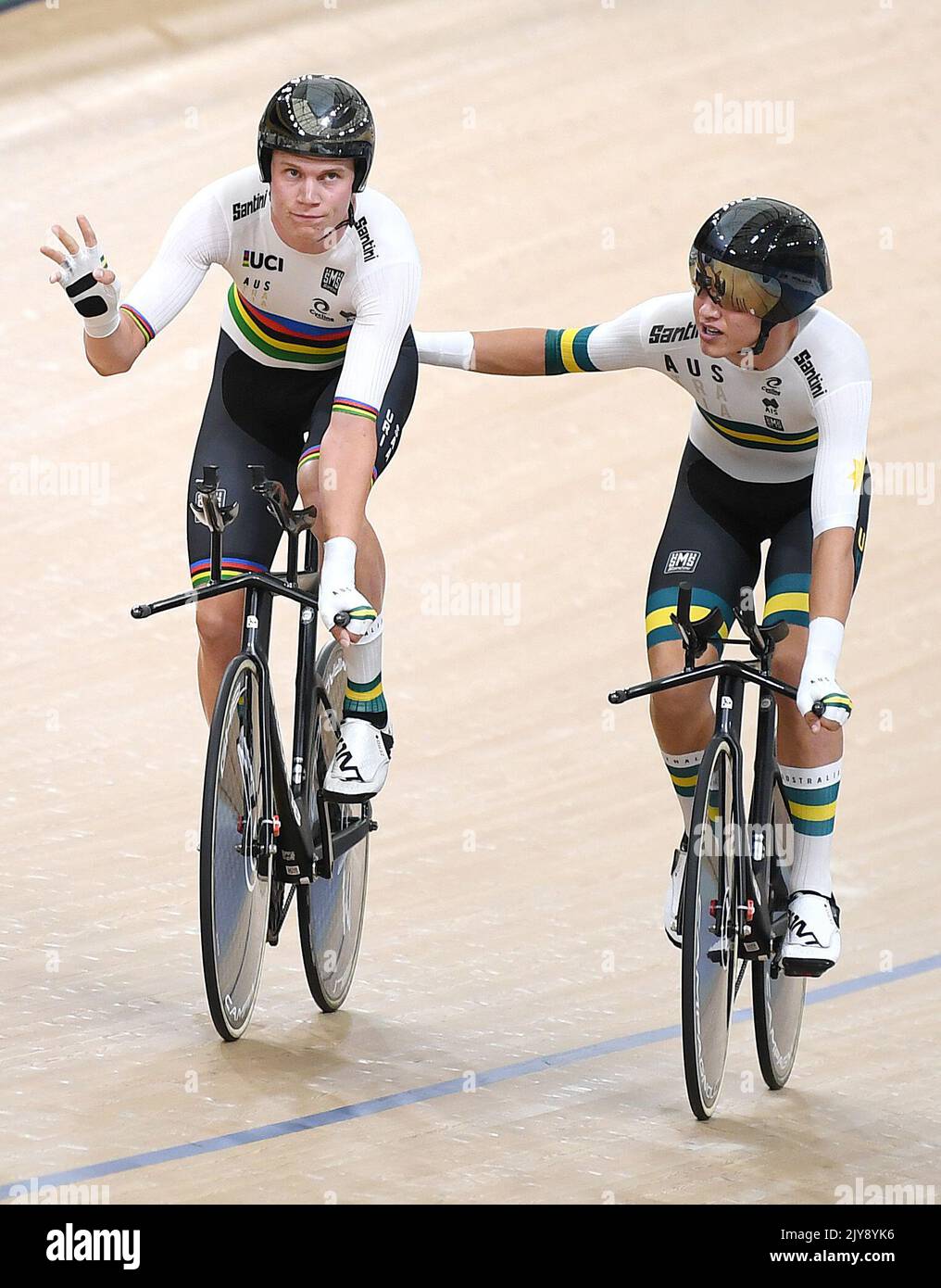 Australian men's team pursuit team members Kelland O'Brien (left) and ...