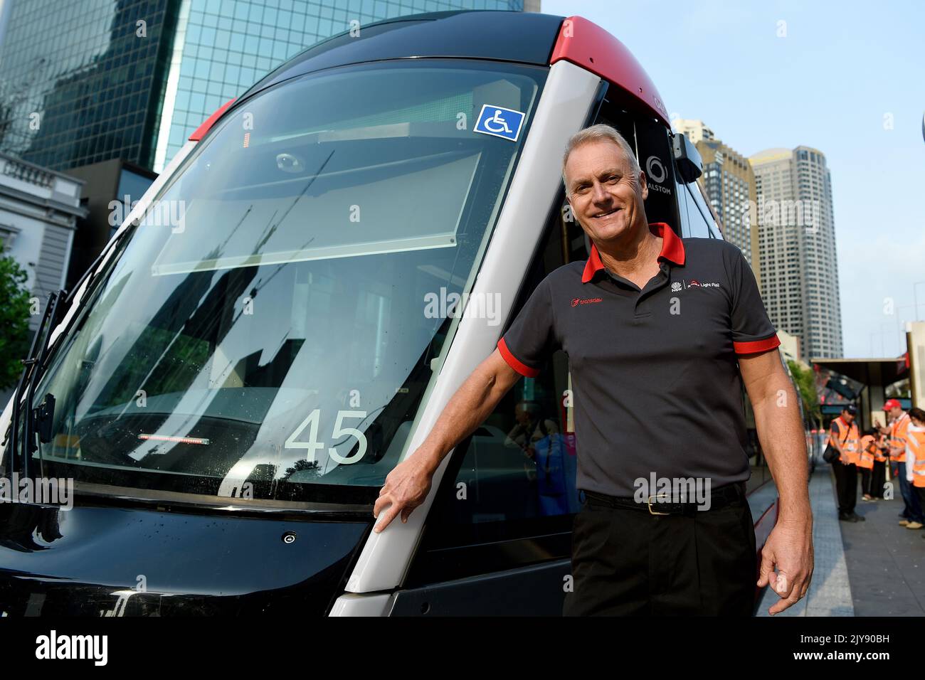 David Cowper, the first driver of the new light rail, poses for a ...