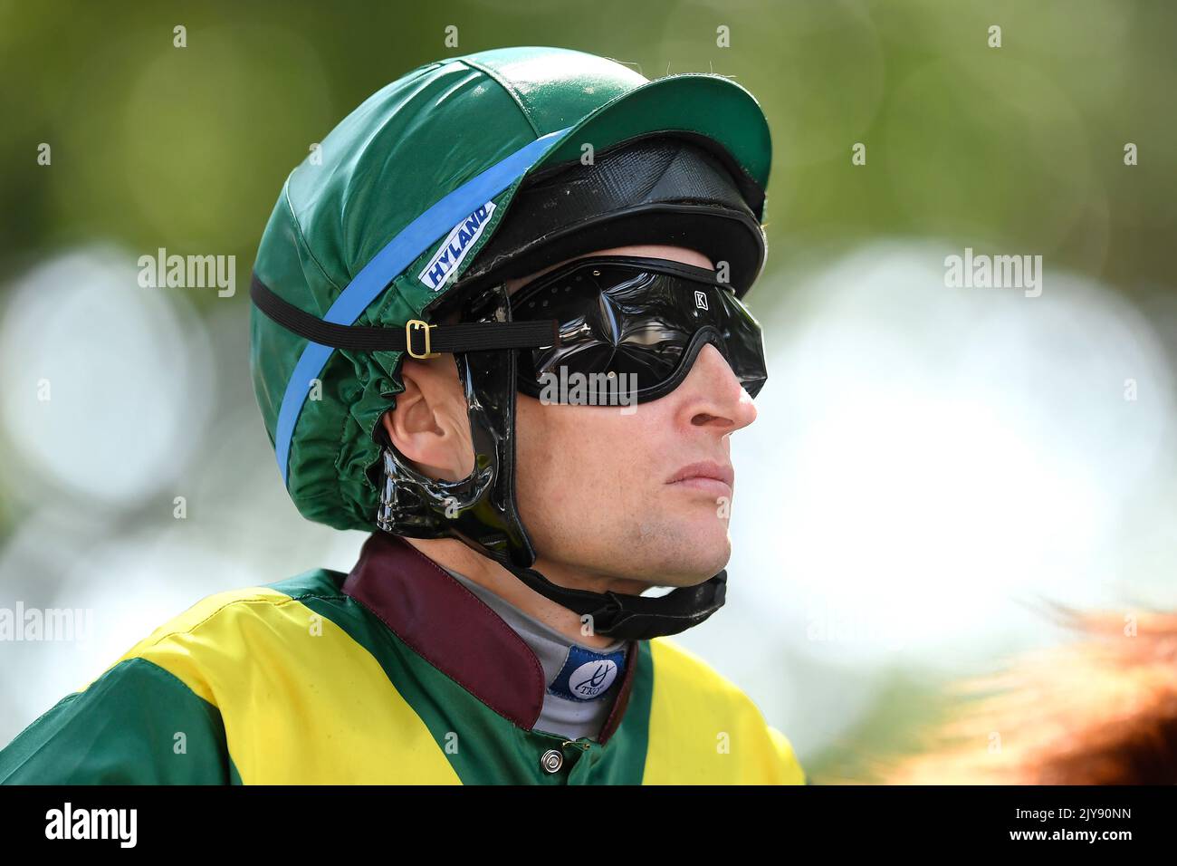 Jockey Craig Newitt makes his way to the start before race 4, the Class ...