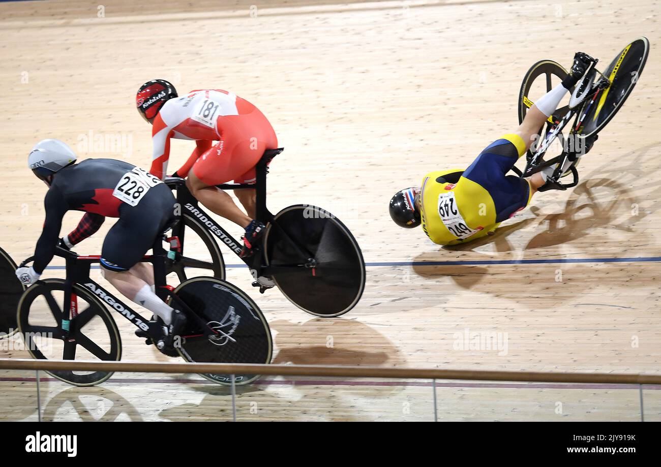 Jai Angsuthasawit of Thailand crashes during the men's Keirin event at ...