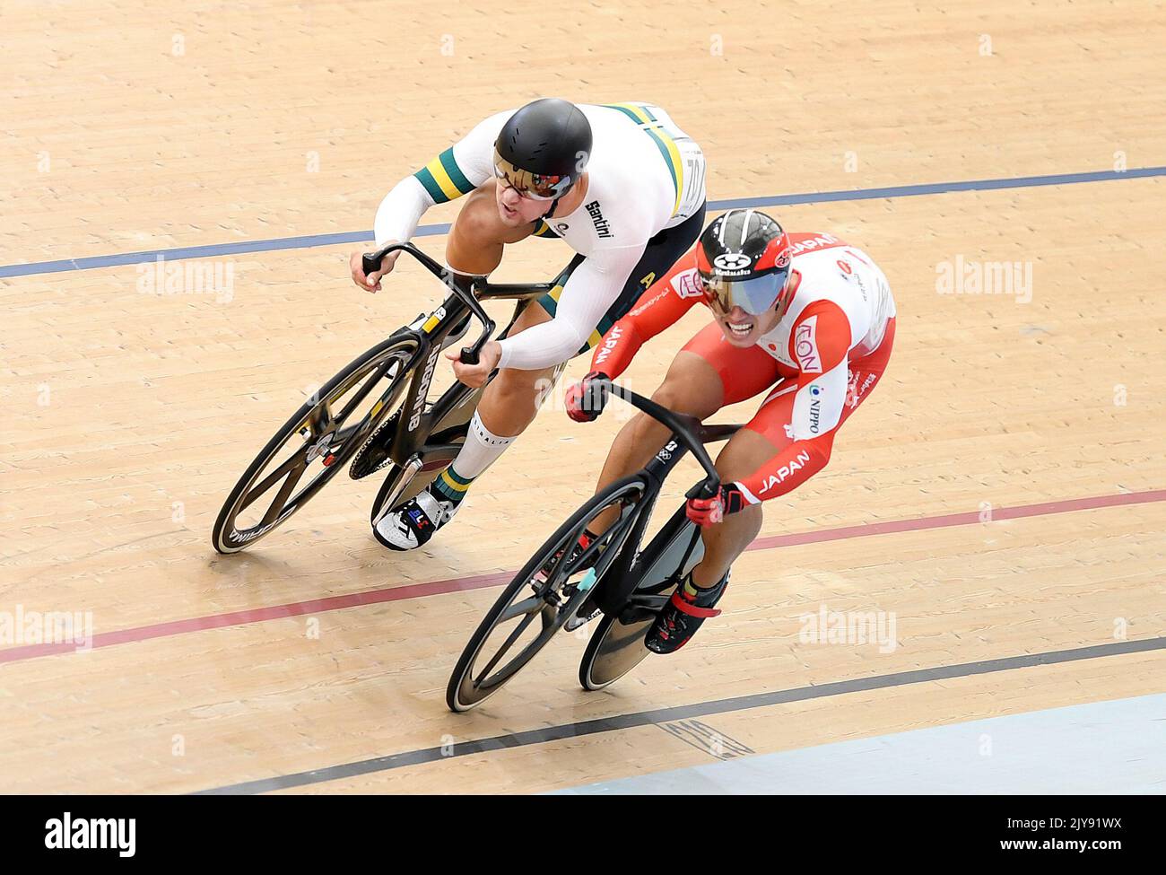 Australia's Matthew Glaetzer (left) races Japan's Yuta Wakimoto during ...