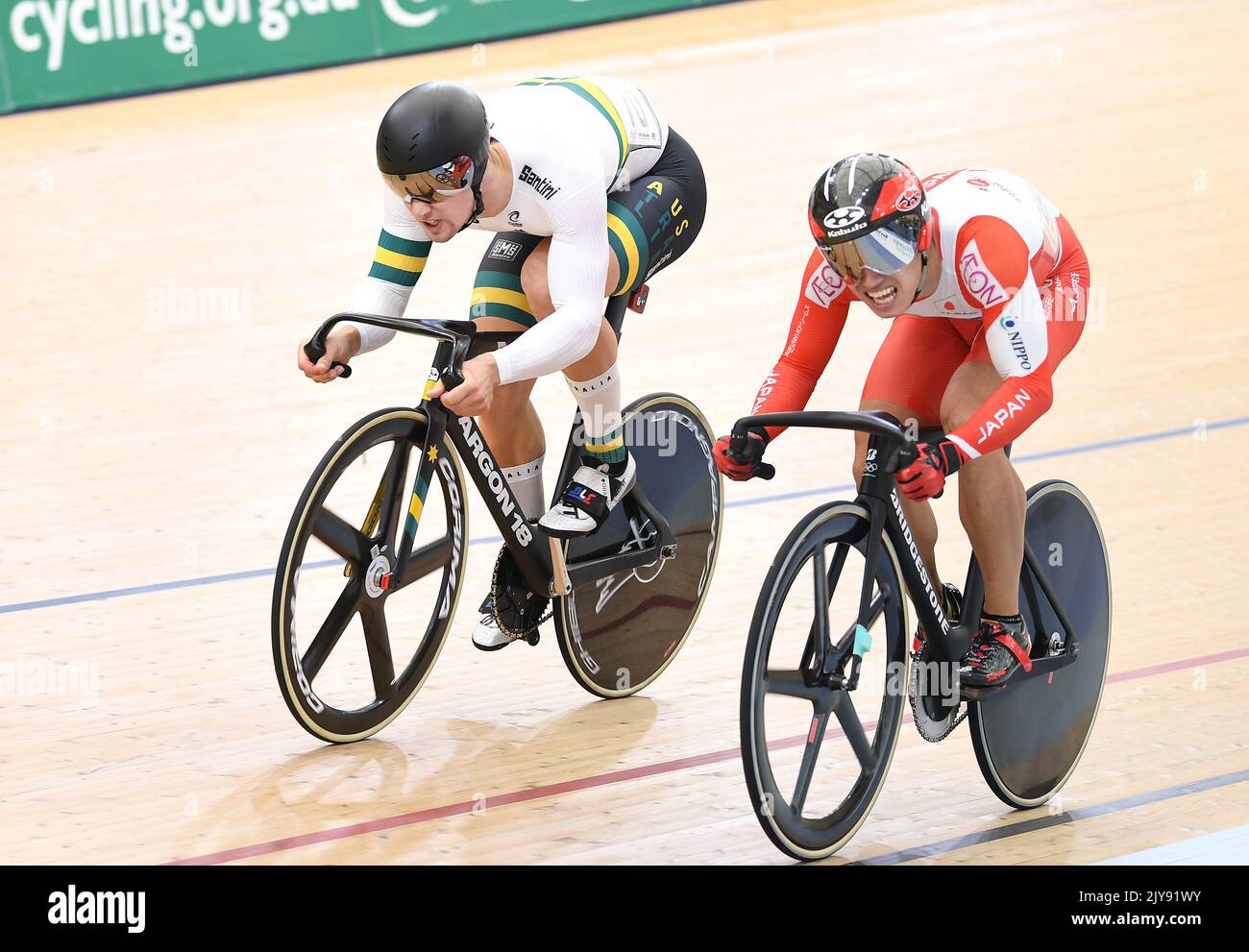Australia's Matthew Glaetzer (left) races Japan's Yuta Wakimoto during ...