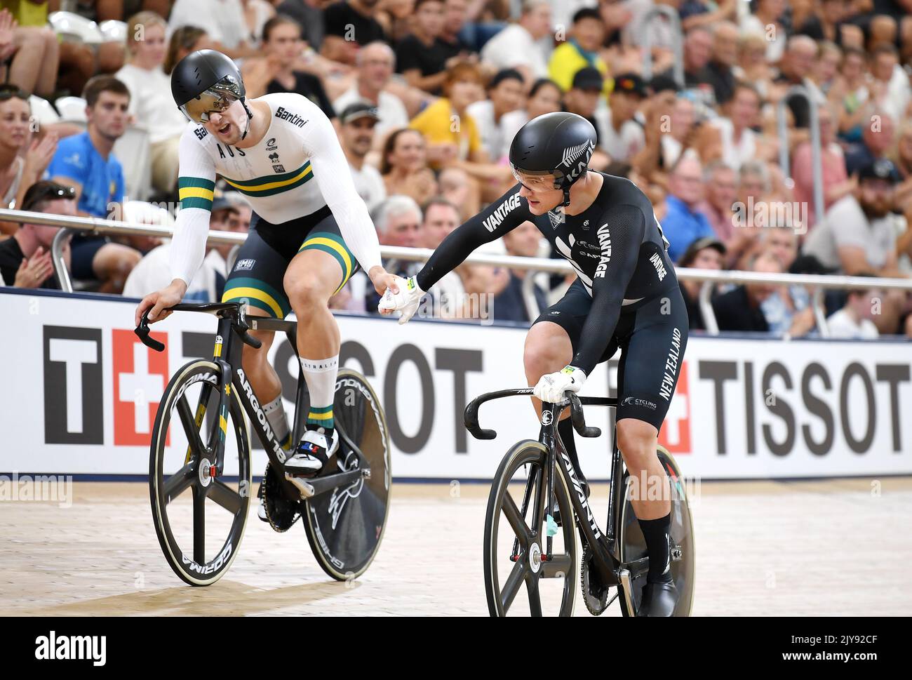 New Zealand's Sam Webster (right) shakes the hand of Australia's ...